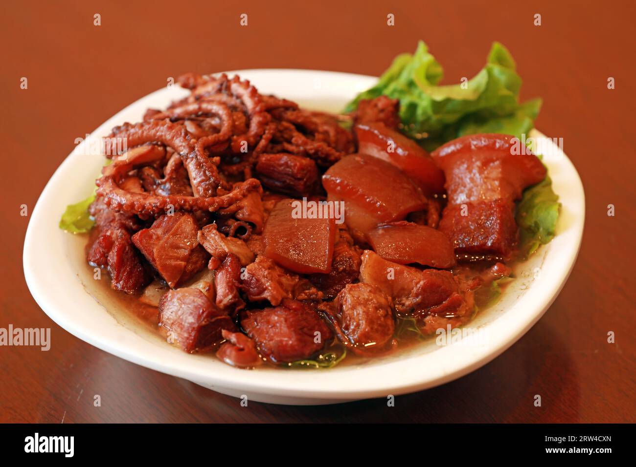 Chinese traditional food, Stewed pork with Octopus Stock Photo - Alamy