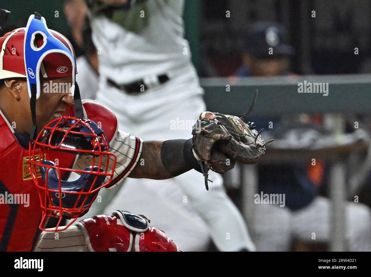 Kansas City Royals catcher Salvador Perez takes a foul ball off the ...