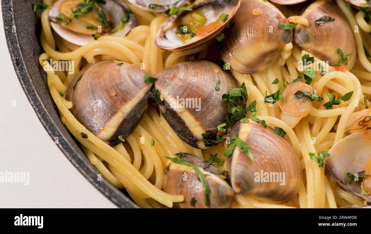 Traditional italian seafood pasta with clams Spaghetti alle Vongole ...