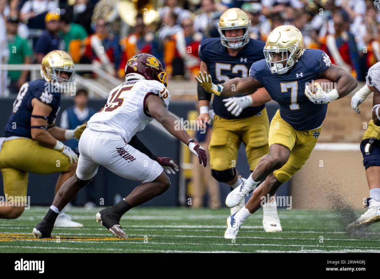 Notre Dame running back Audric Estime (7) fends off Central Michigan ...