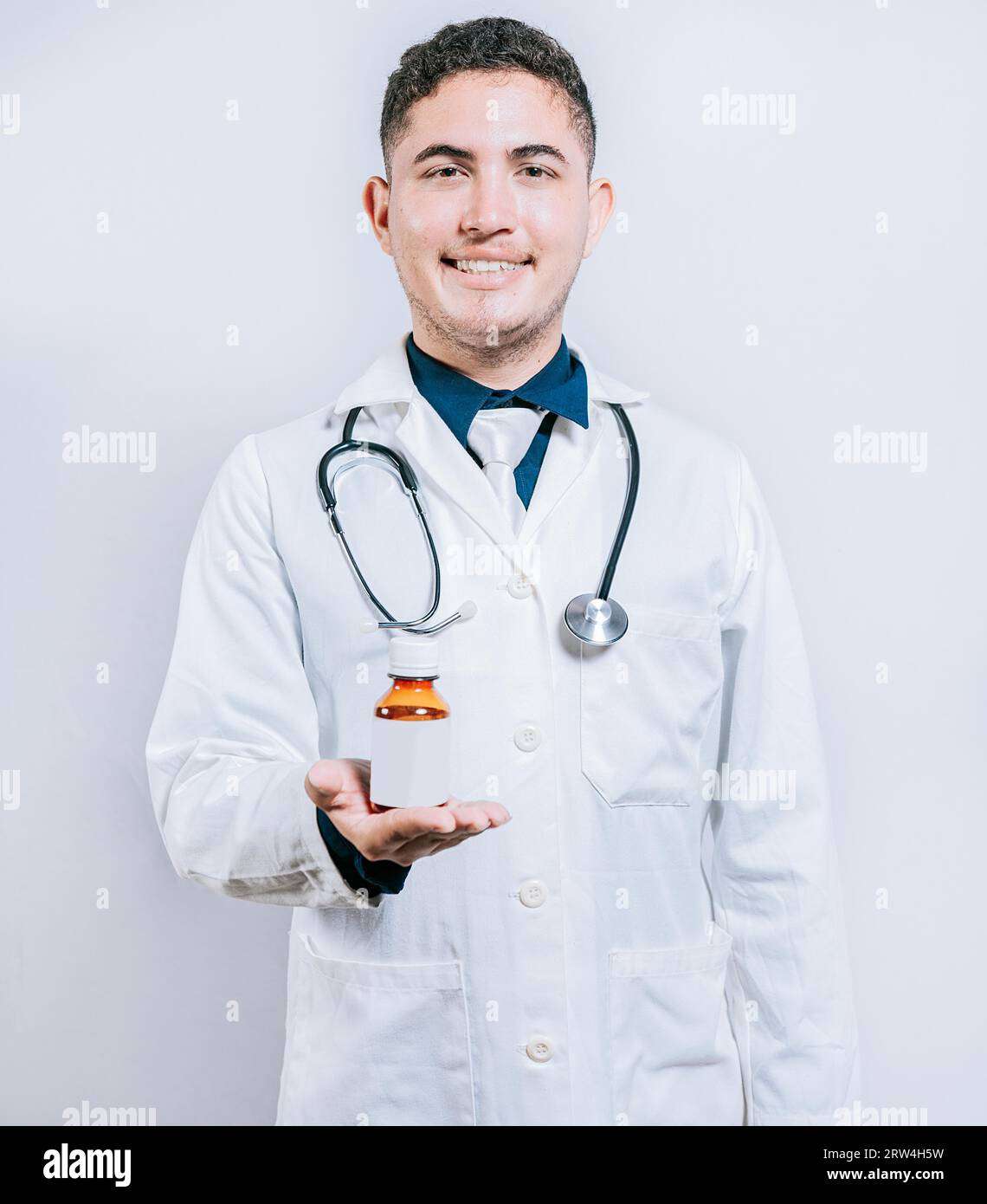 Doctor with cough syrup hi-res stock photography and images - Alamy