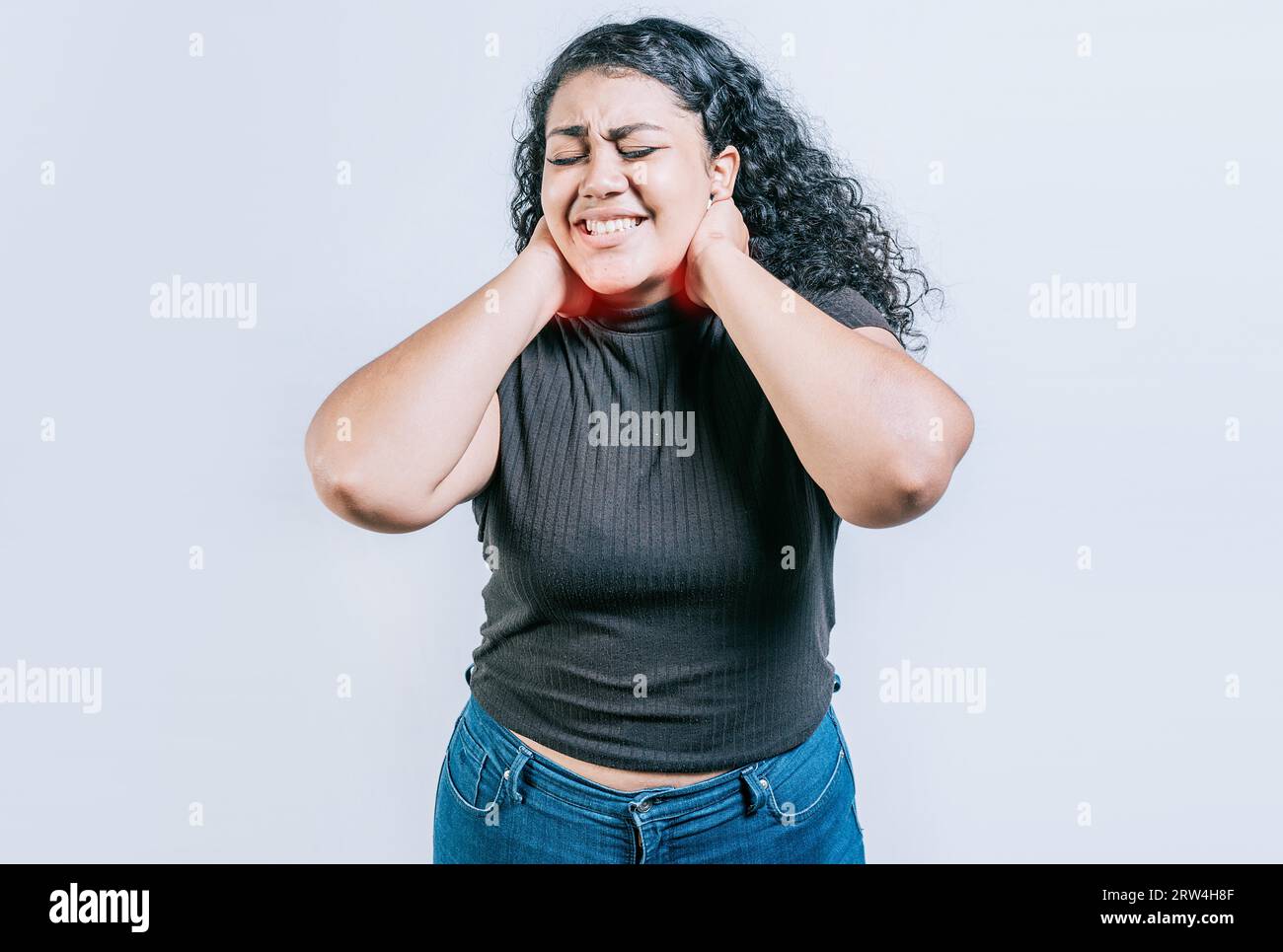 Girl with neck pain isolated. Young woman suffering with neck pain ...