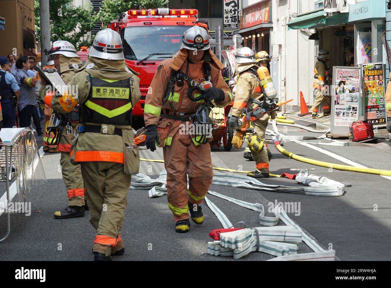 Firefighters are seen at a fire site in Tokyo on Aug. 15, 2023. ( The ...