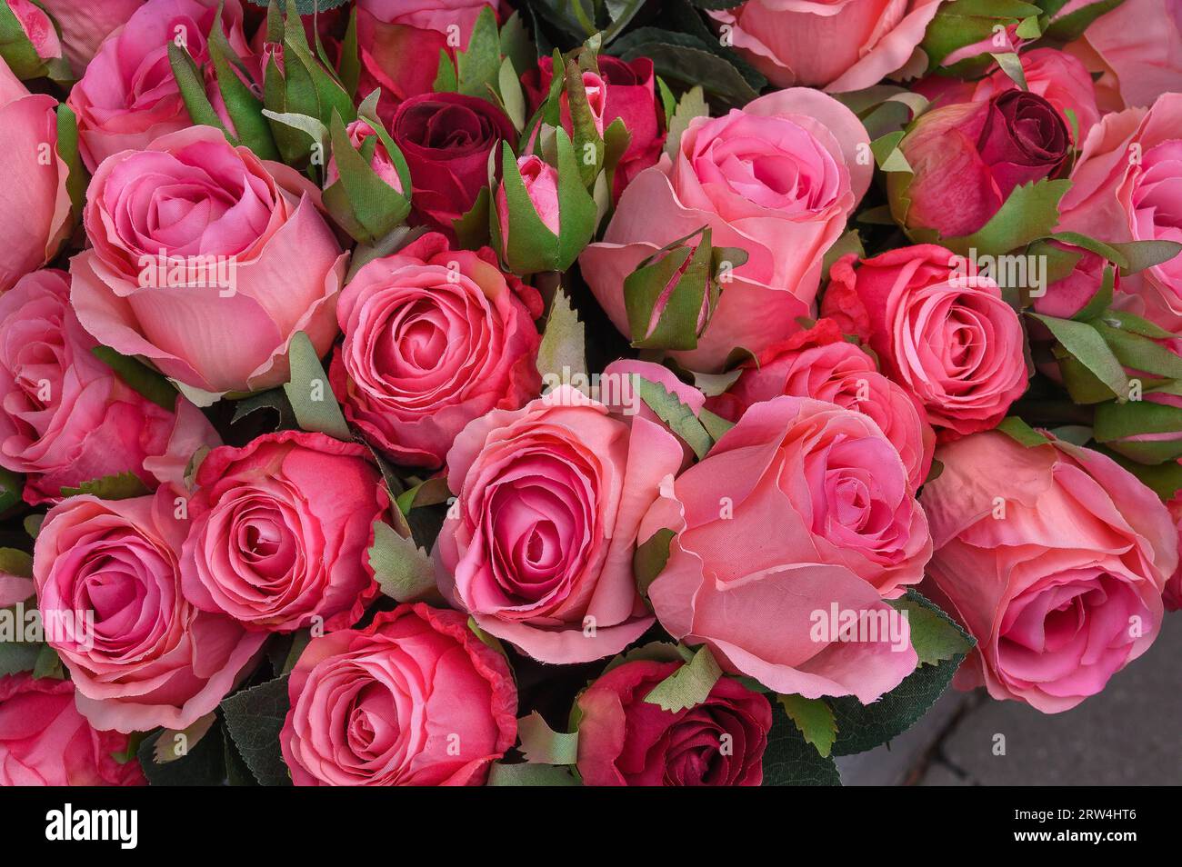Artificial pink roses, artificial roses, in a garden centre, Allgaeu ...