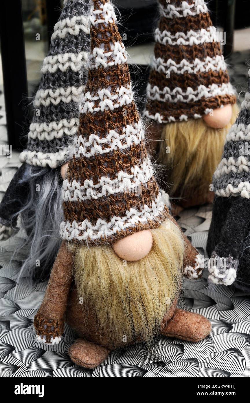 Dwarfs with long beards and huge woolly hats in a garden centre ...