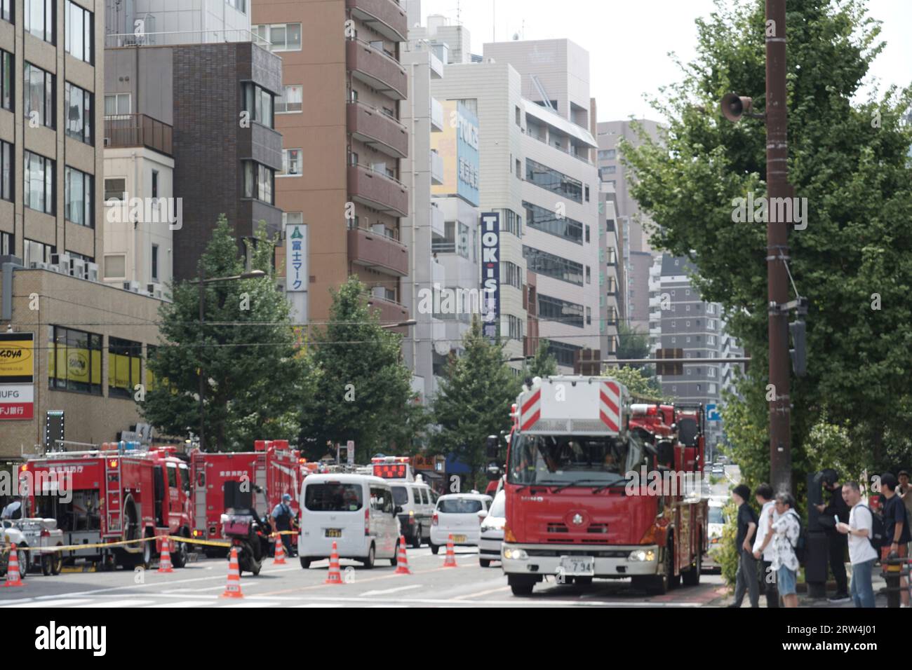 Fire engines are seen at a fire site in Tokyo on Aug. 15, 2023. ( The ...