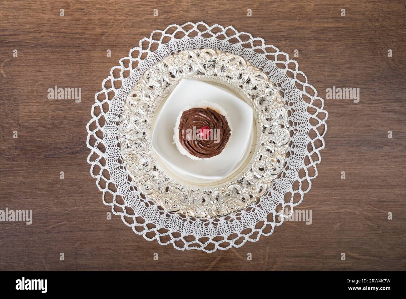 Bird's eye view of cupcakes with coconut flakes and a topping of ...