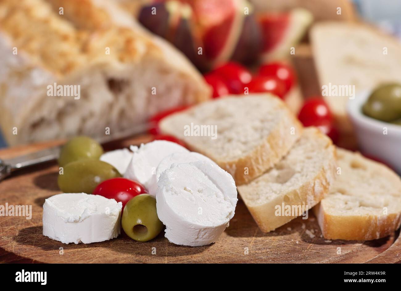 Ferisch cheese rolls on slices of white bread Stock Photo - Alamy