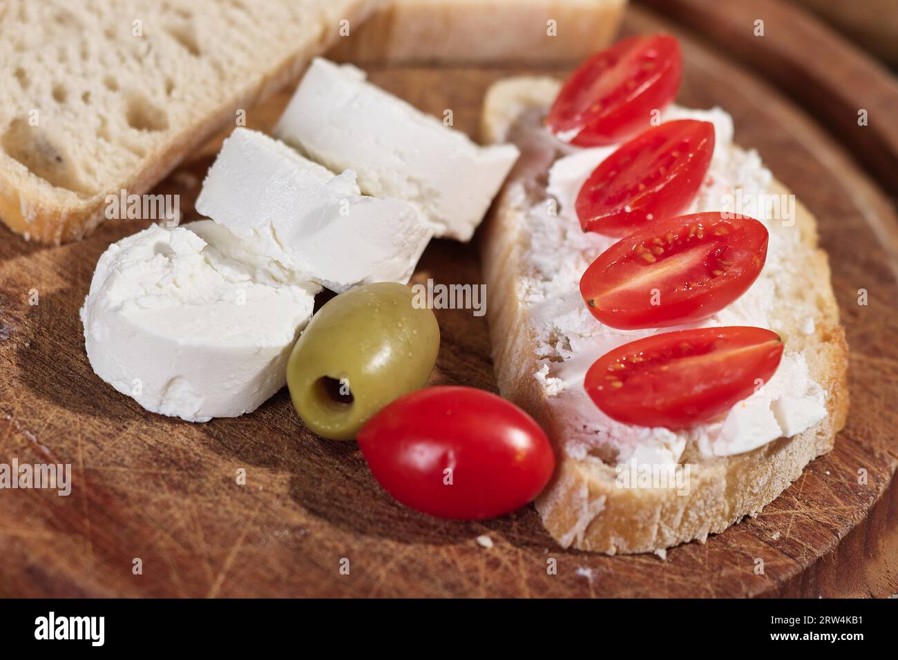 Cream cheese rolls on slices of white bread Stock Photo - Alamy