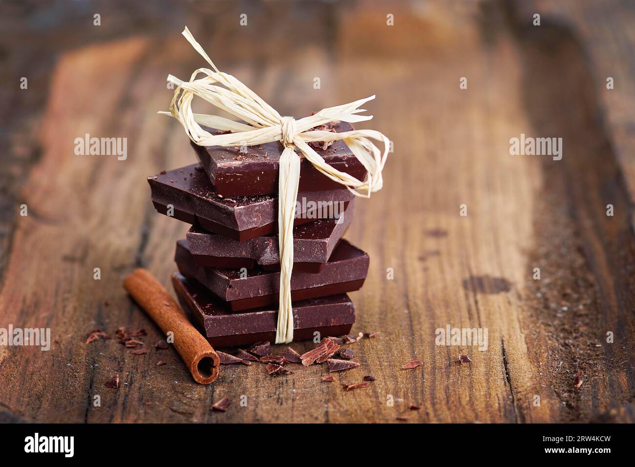 Chocolate pieces placed on top of each other and tied together with ...