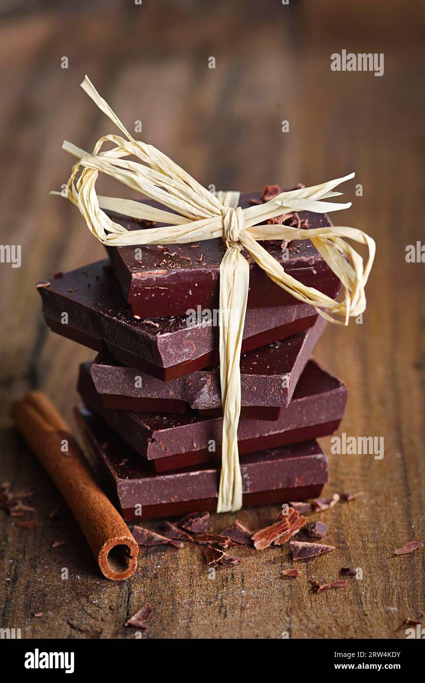 Chocolate pieces placed on top of each other and tied together with ...