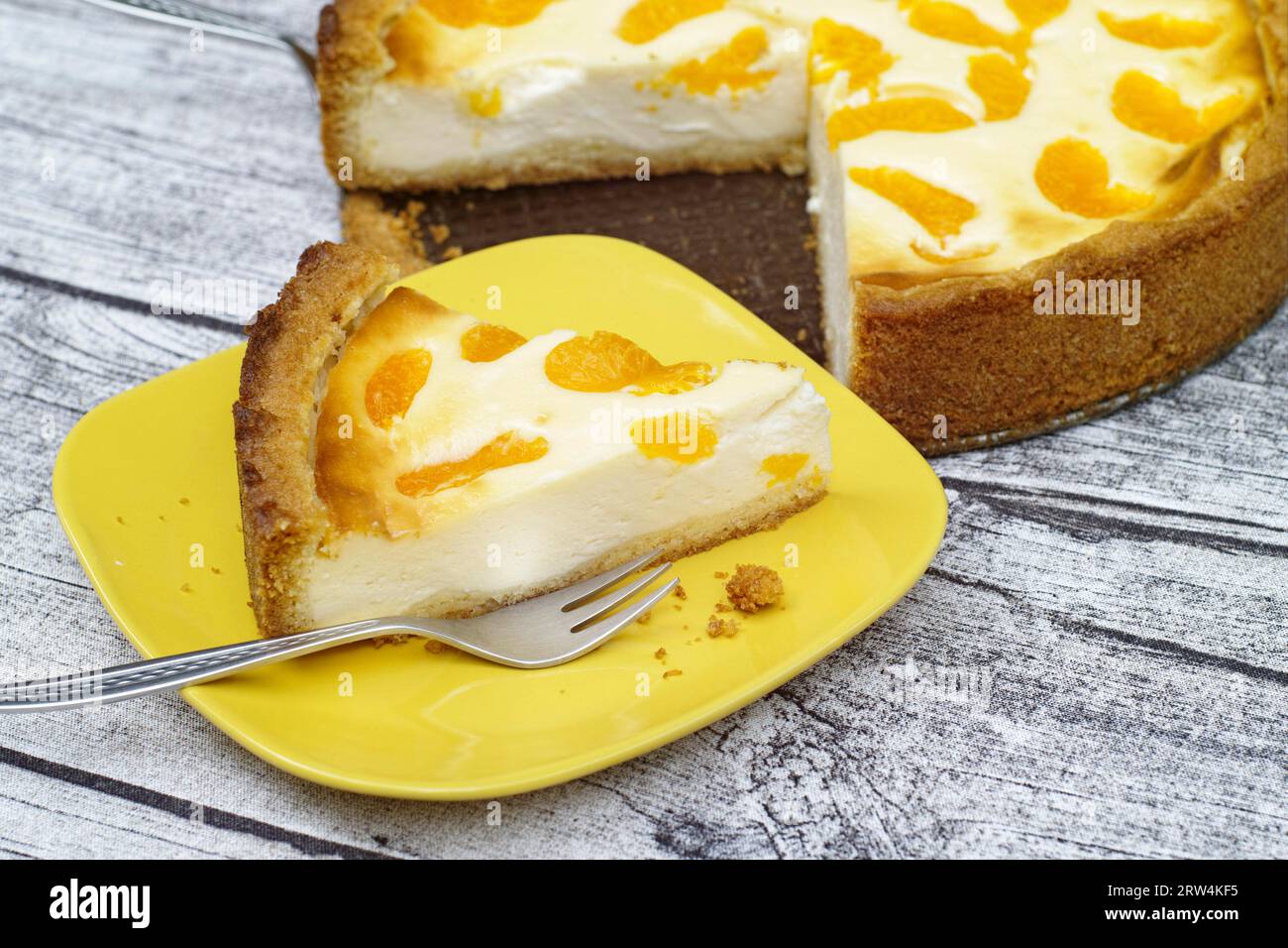 Freshly baked Schmandt cake with tangerines Stock Photo - Alamy