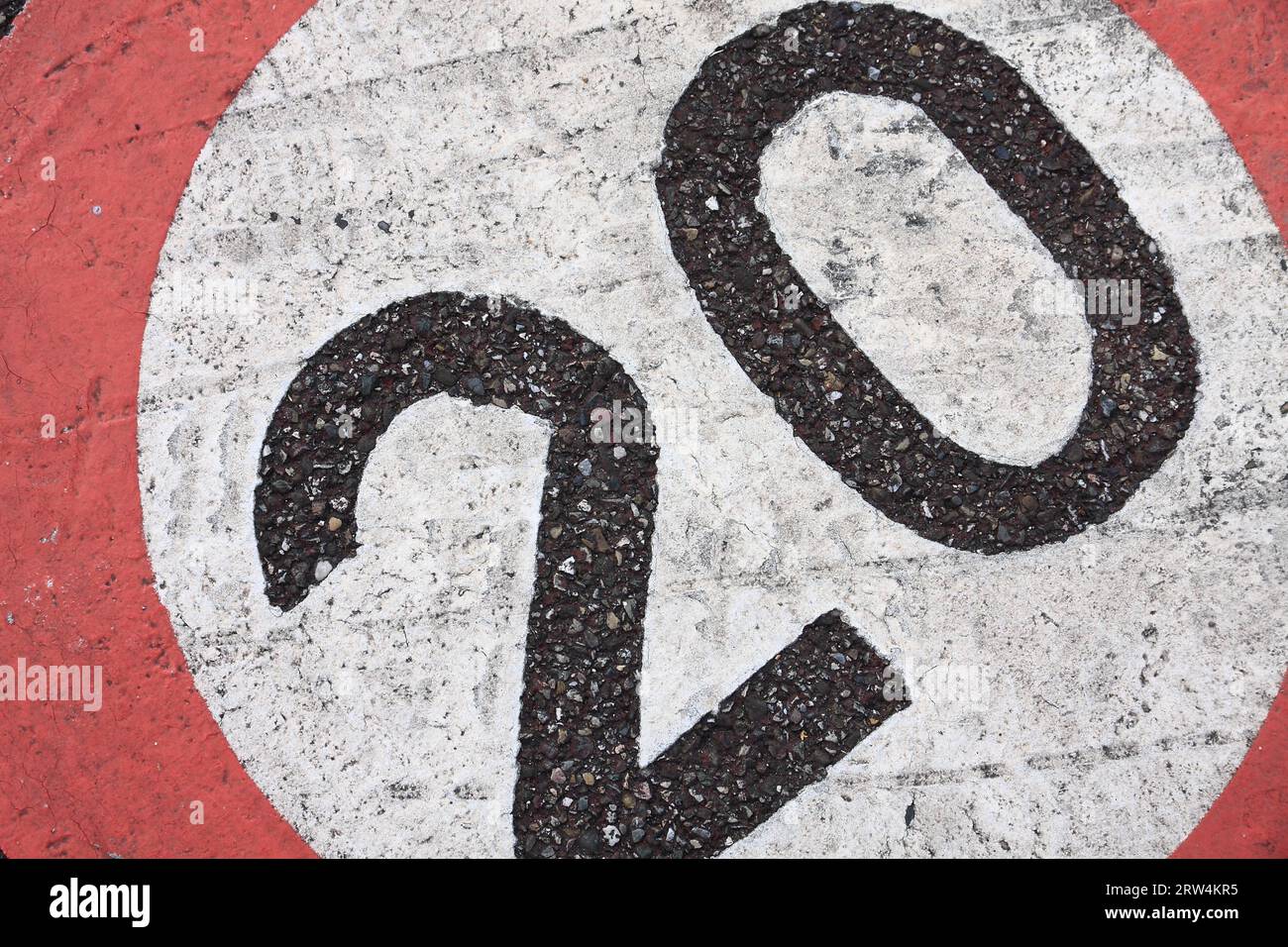 Painted speed limit, 20 kmh, format-filling Stock Photo - Alamy