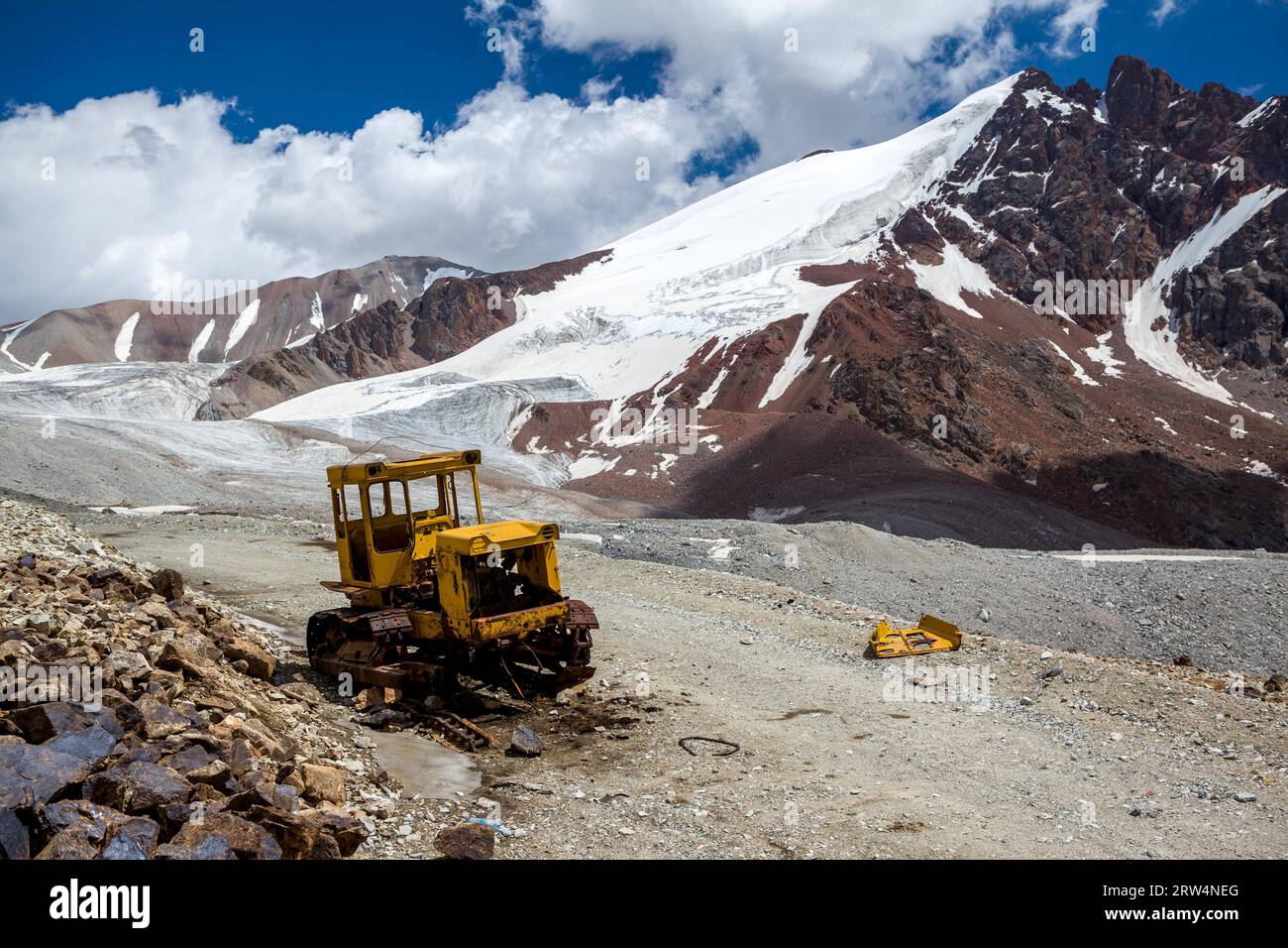Abandoned broken bulldozer. Kok-Airyk pass, Tien Shan mountains ...