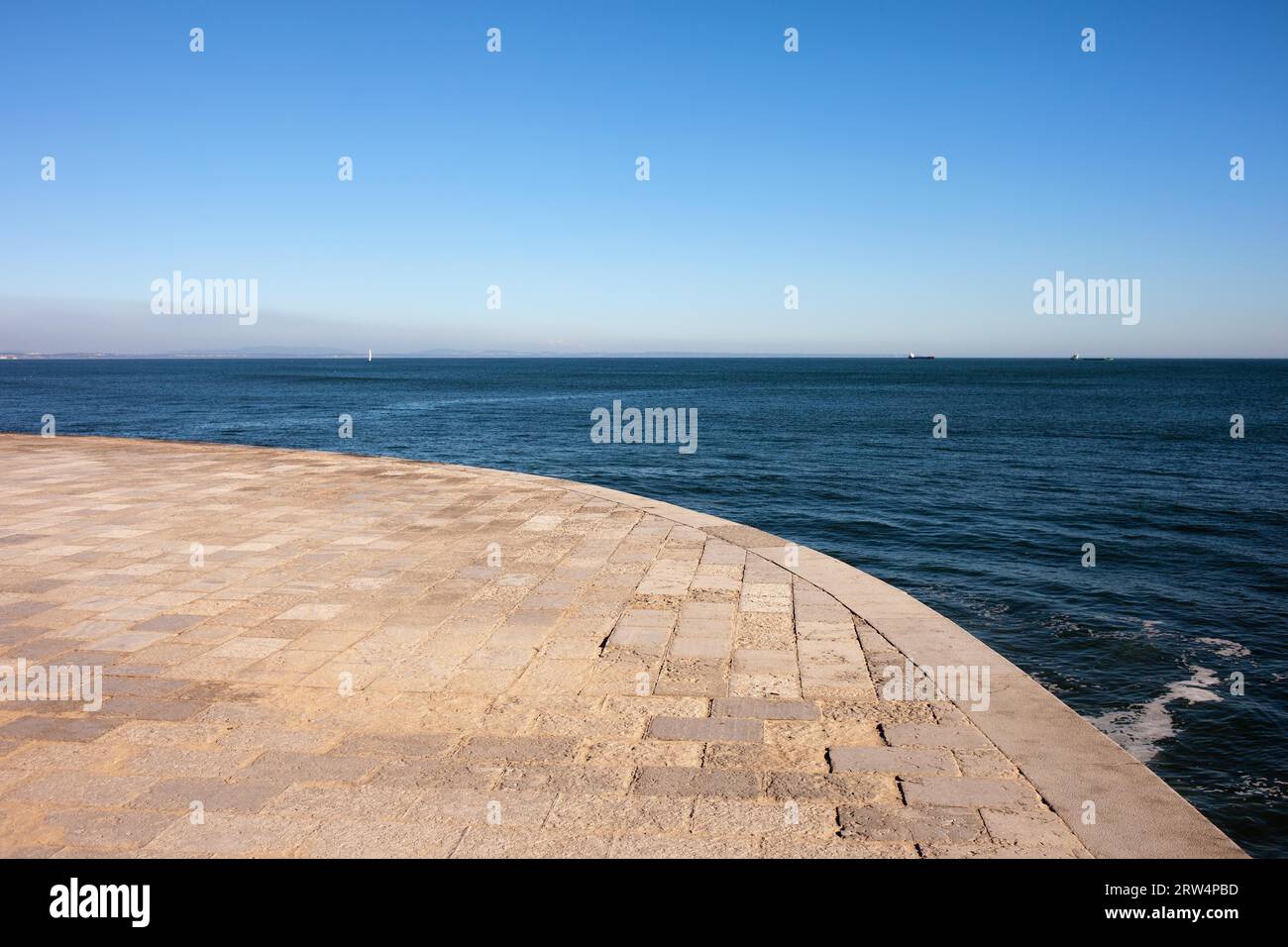 Promenade along the sea on a sunny day Stock Photo - Alamy