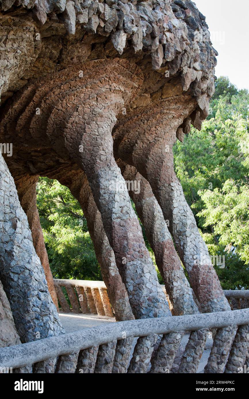 Leaning columns of colonnaded terrace by Antoni Gaudi in Park Guell in ...