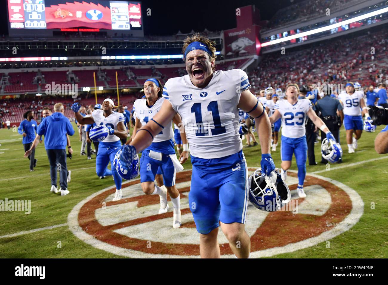 BYU linebacker Harrison Taggart (11) and teammates celebrate a win over ...