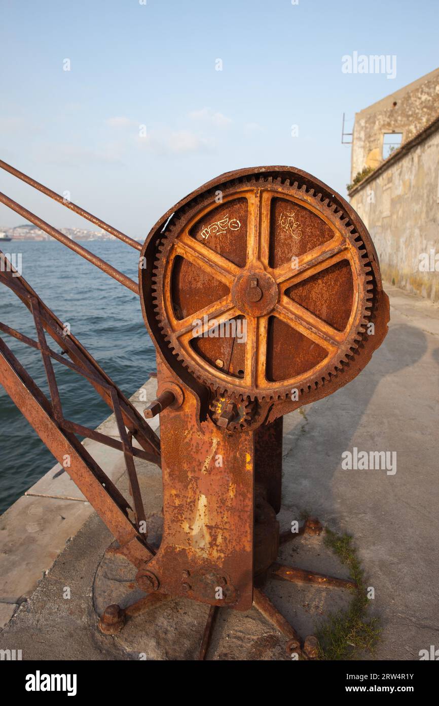 Rusty gear of a crane at river waterfront Stock Photo - Alamy