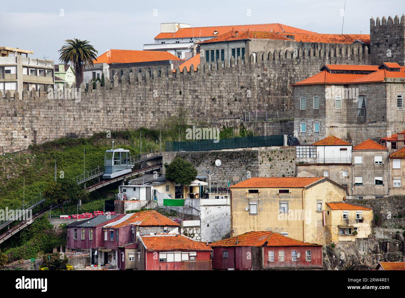 Fernandina old city wall and Funicular dos Guindais in Porto, Portugal ...