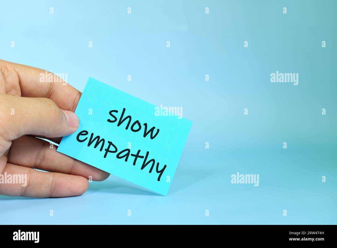 Hand holding sticky note written note hi-res stock photography and ...