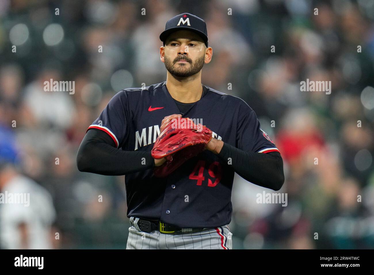 Minnesota Twins starting pitcher Pablo Lopez walks back to the dugout ...