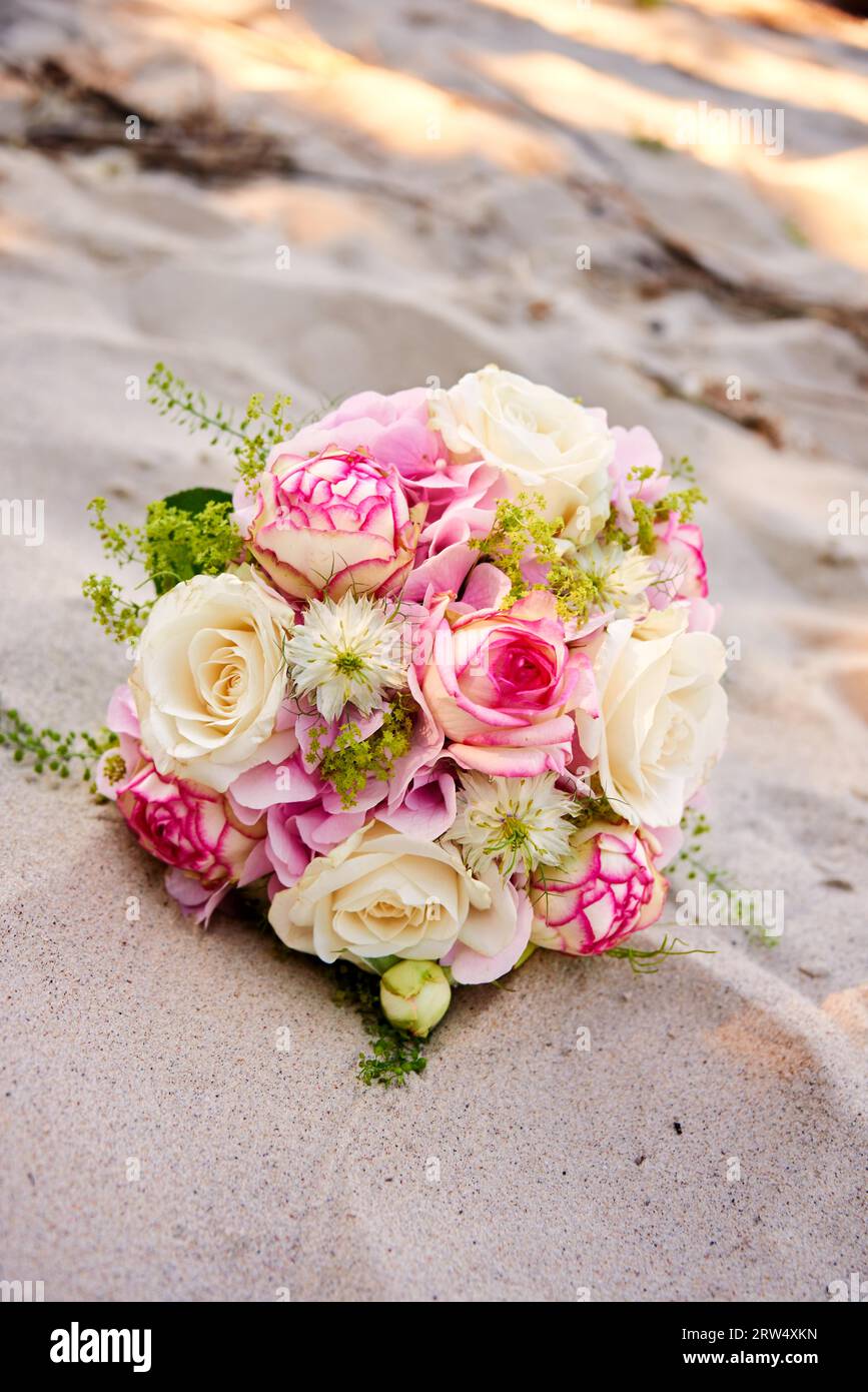 A bouquet of flowers on beach Stock Photo - Alamy