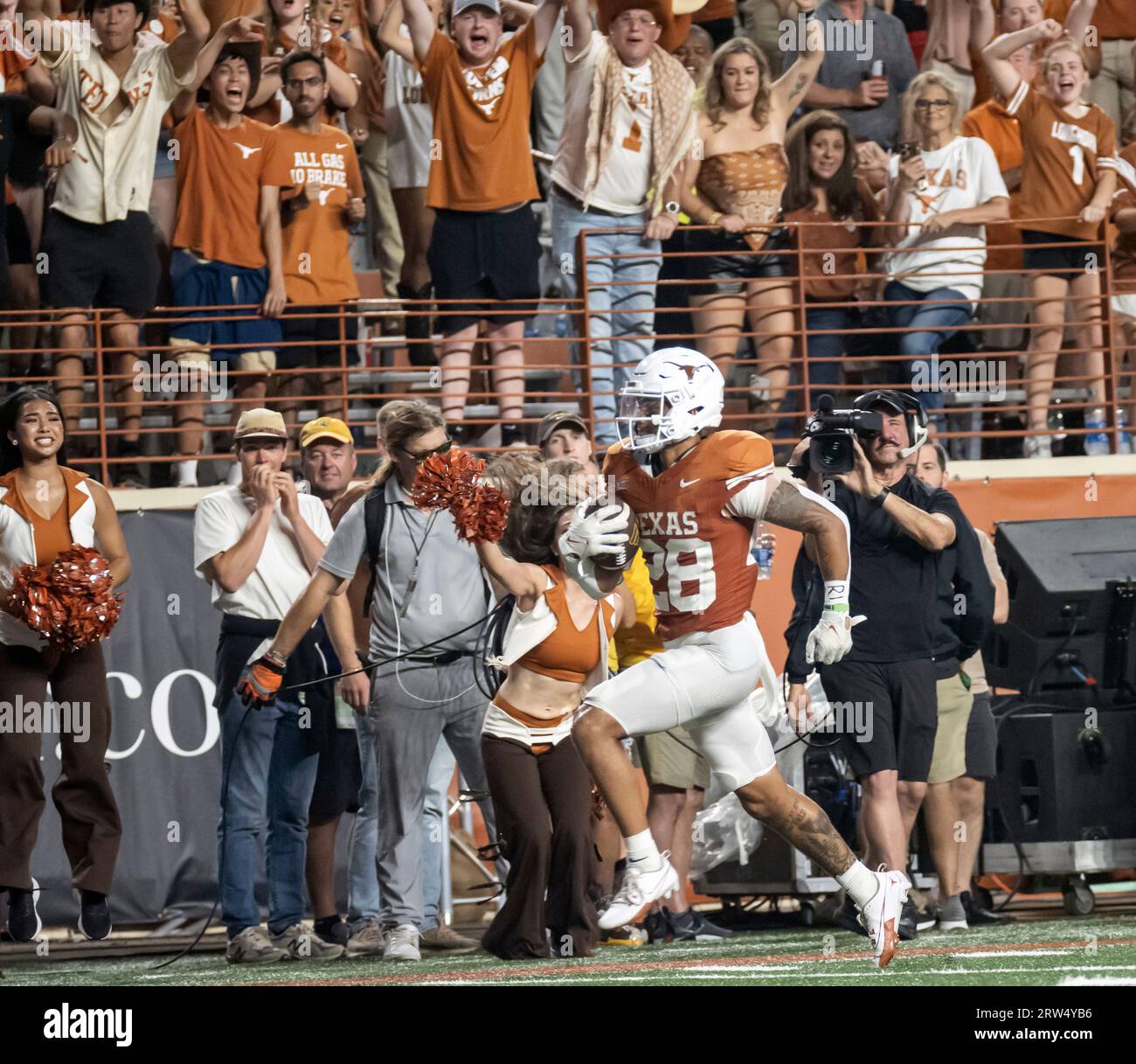 Texas defensive back JerrinThompson returns an interception of a ...