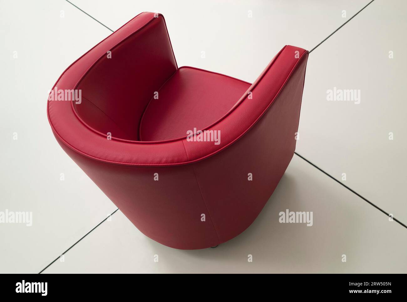 The red armchair Stock Photo - Alamy