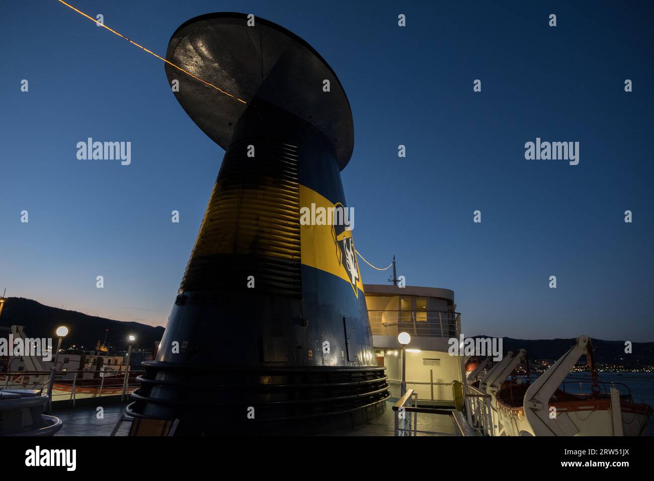 Night view over one of the many ferries connecting the mainland with ...