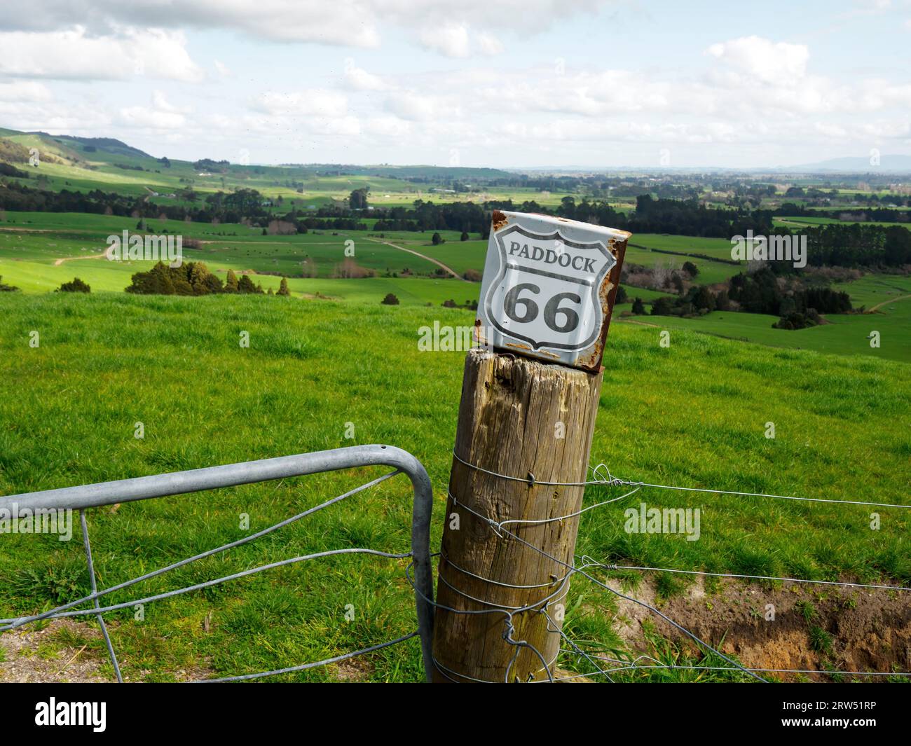 Green pastures with Paddock 66 sign. Wairere falls track, Waikato ...