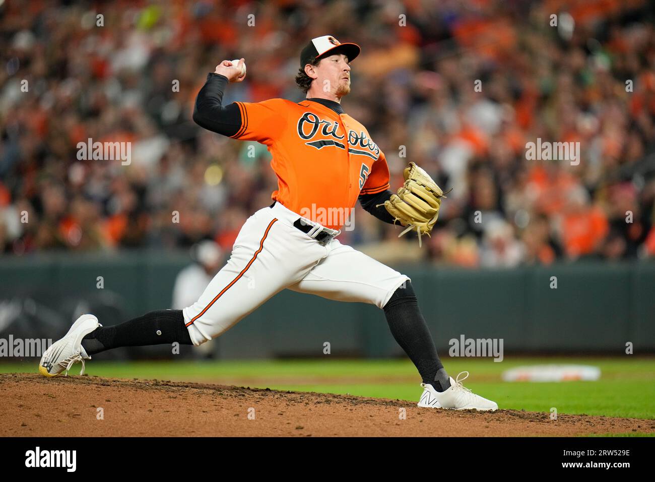 Baltimore Orioles pitcher Mike Baumann throws in the ninth inning of a ...