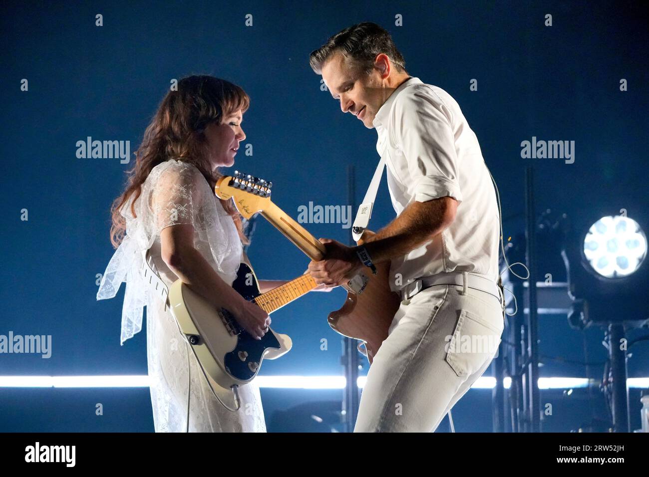 Jenny Lewis, left, and Ben Gibbard of The Postal Service perform on day ...