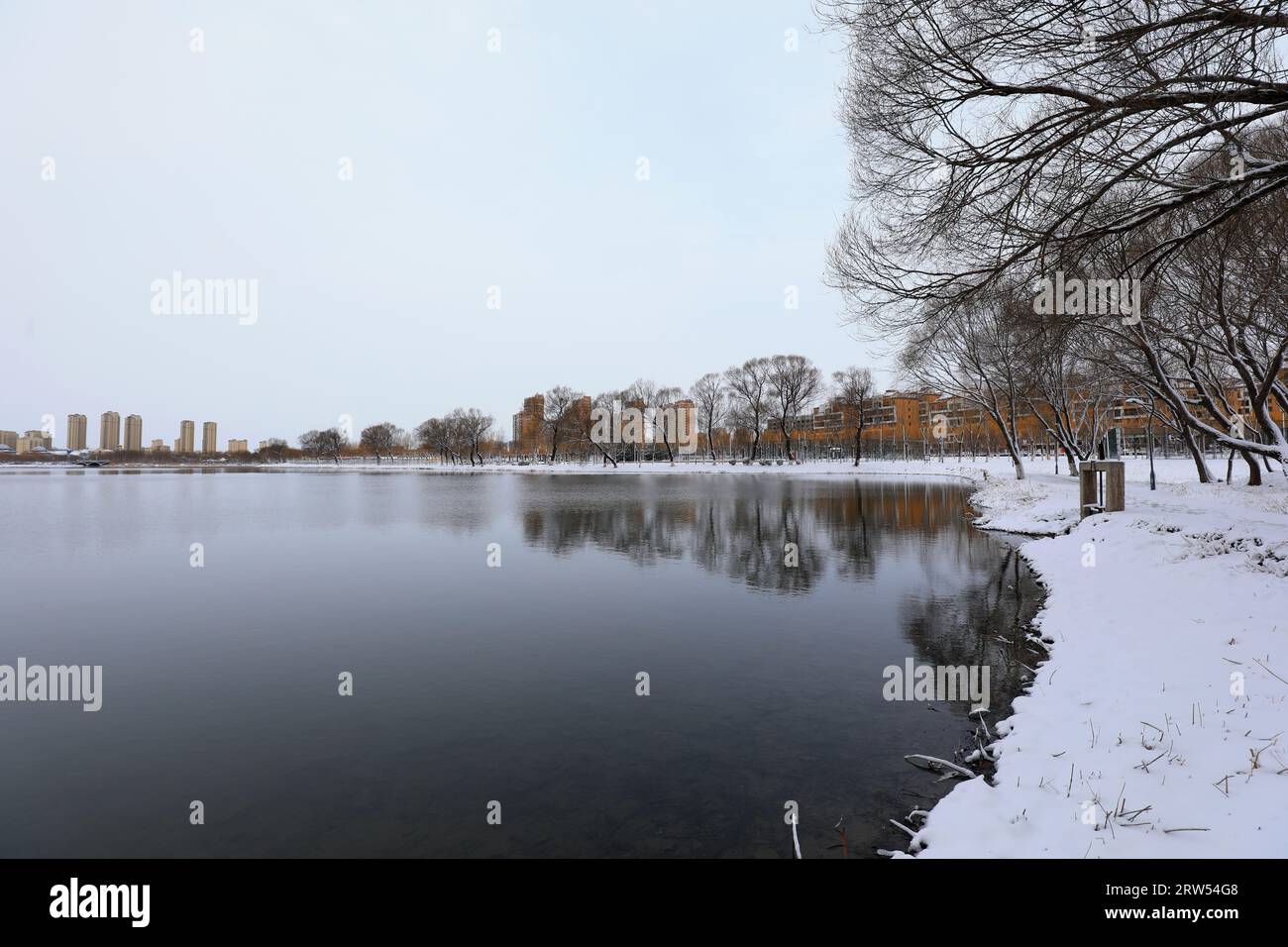 Snowscape of waterfront city, North China Stock Photo - Alamy