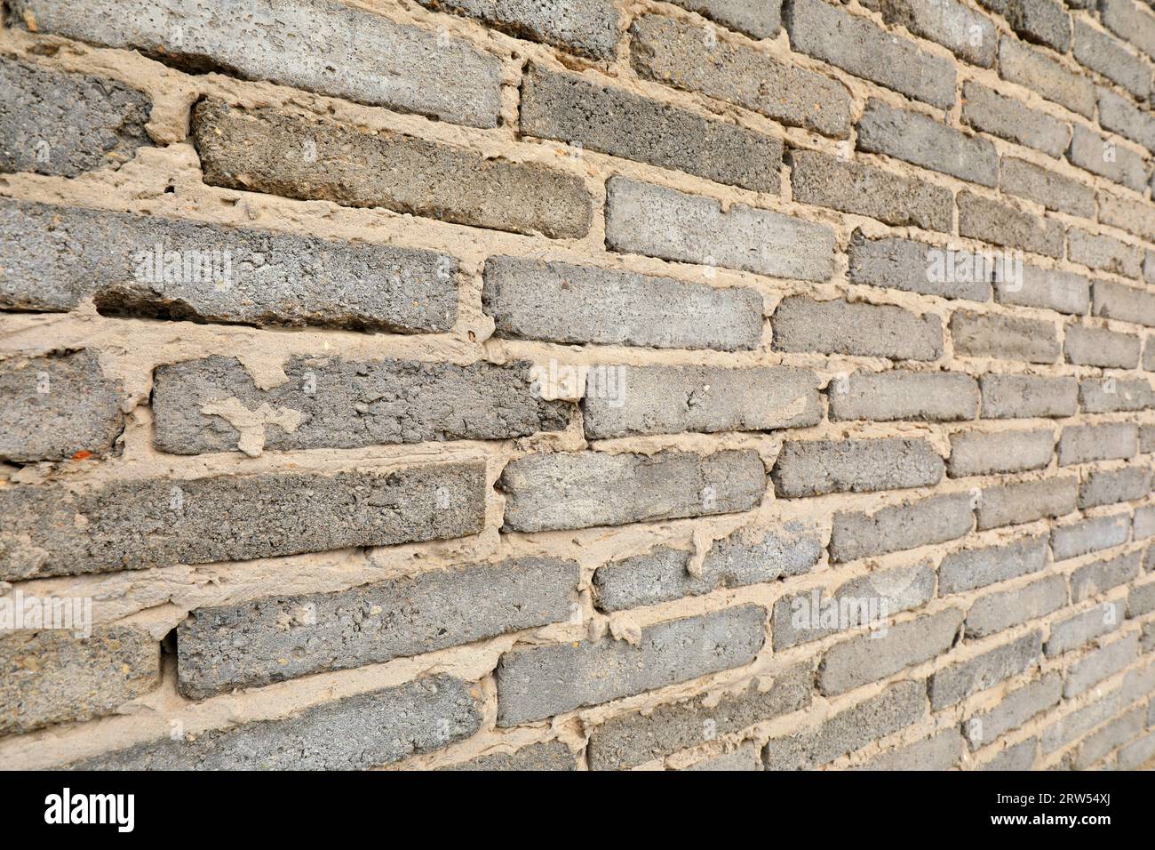 Gray brick wall building plan Stock Photo - Alamy