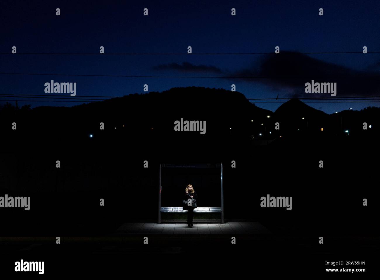 Santiago, Metropolitana, Chile. 16th Sep, 2023. A woman waits for ...