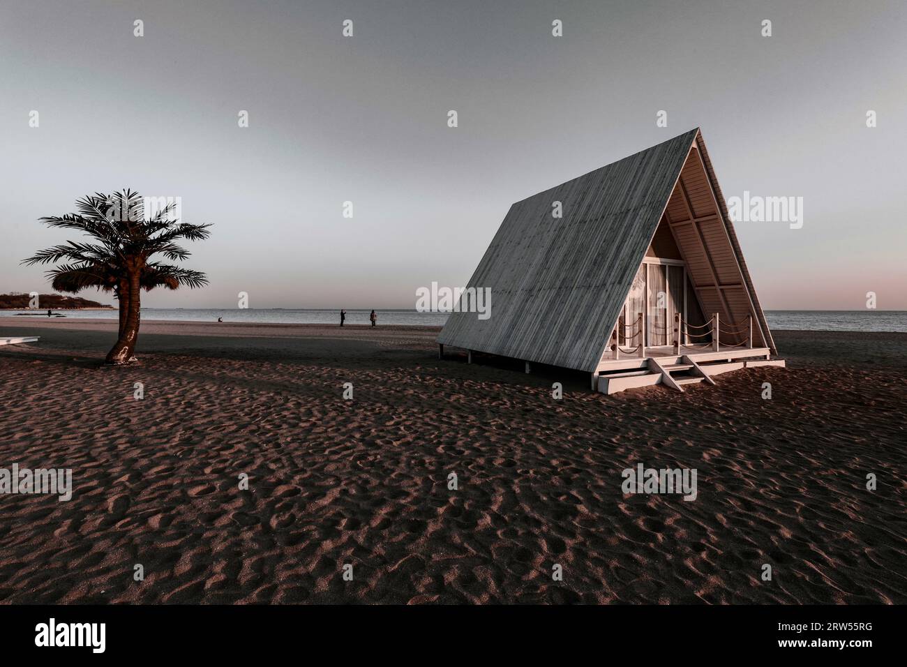 Triangle cabin on the beach, North China Stock Photo - Alamy