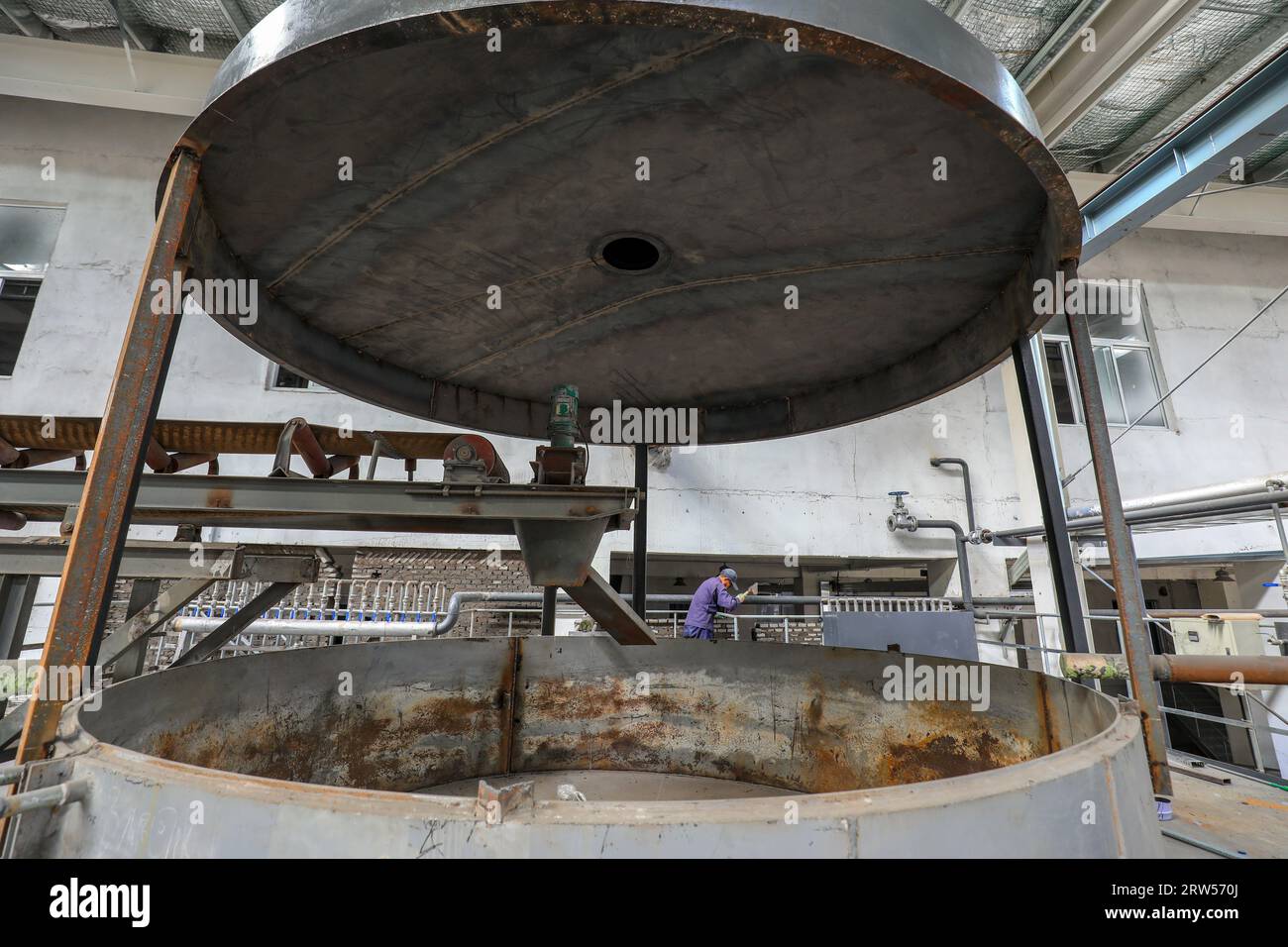 workers carry out civil construction in a factory building Stock Photo ...
