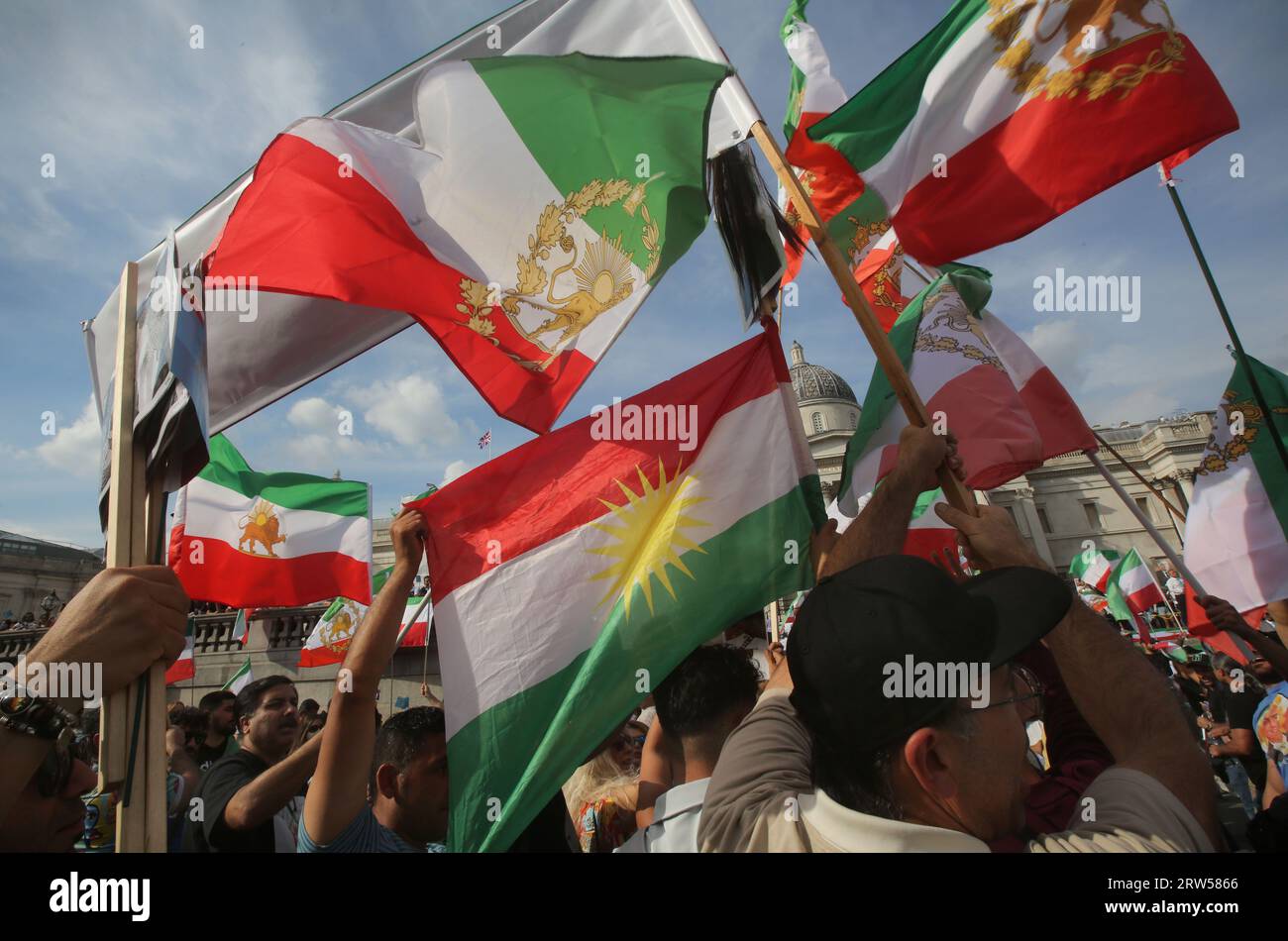 The battle of the flags as the Kurdish flag (with the yellow sun) is ...