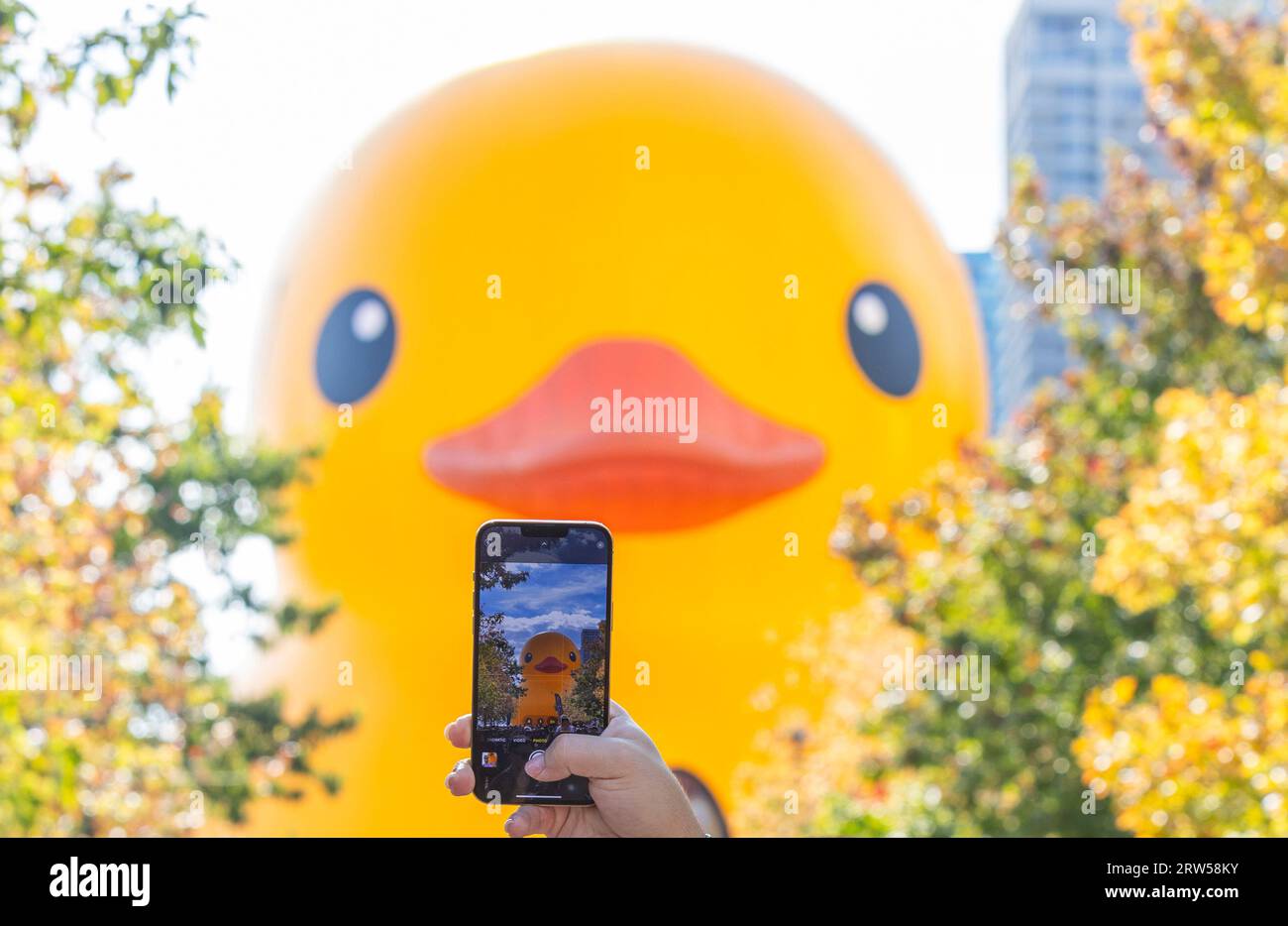 Toronto, Canada. 16th Sep, 2023. A tourist takes photos of a giant ...