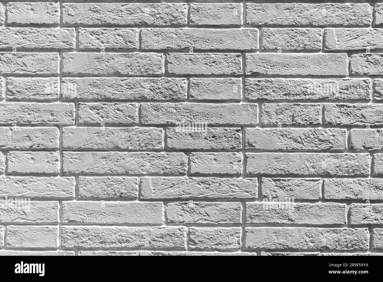 Front view shot of a gray brick wall. Use as background and texture ...