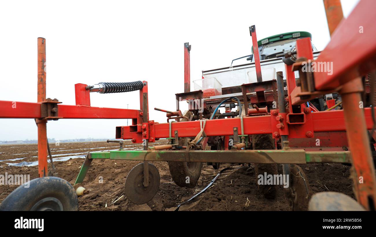 Corn planter in the field, North China Stock Photo - Alamy