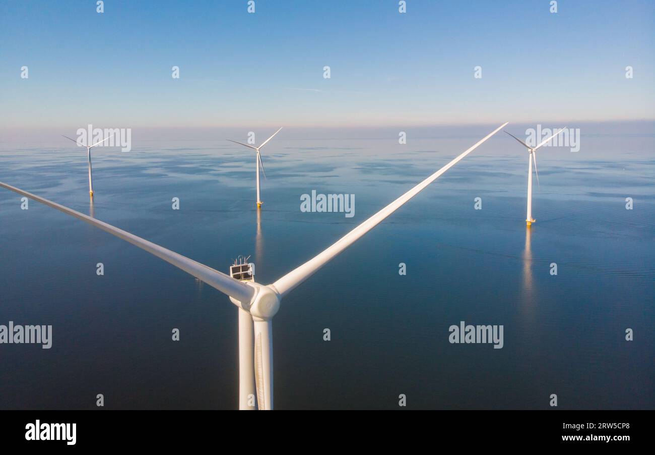 Ocean Wind Farm. Windmill farm in the ocean. Offshore wind turbines in ...