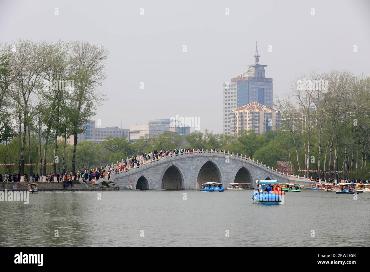 Stone arch bridge in Beijing Yuyuantan Park Stock Photo - Alamy