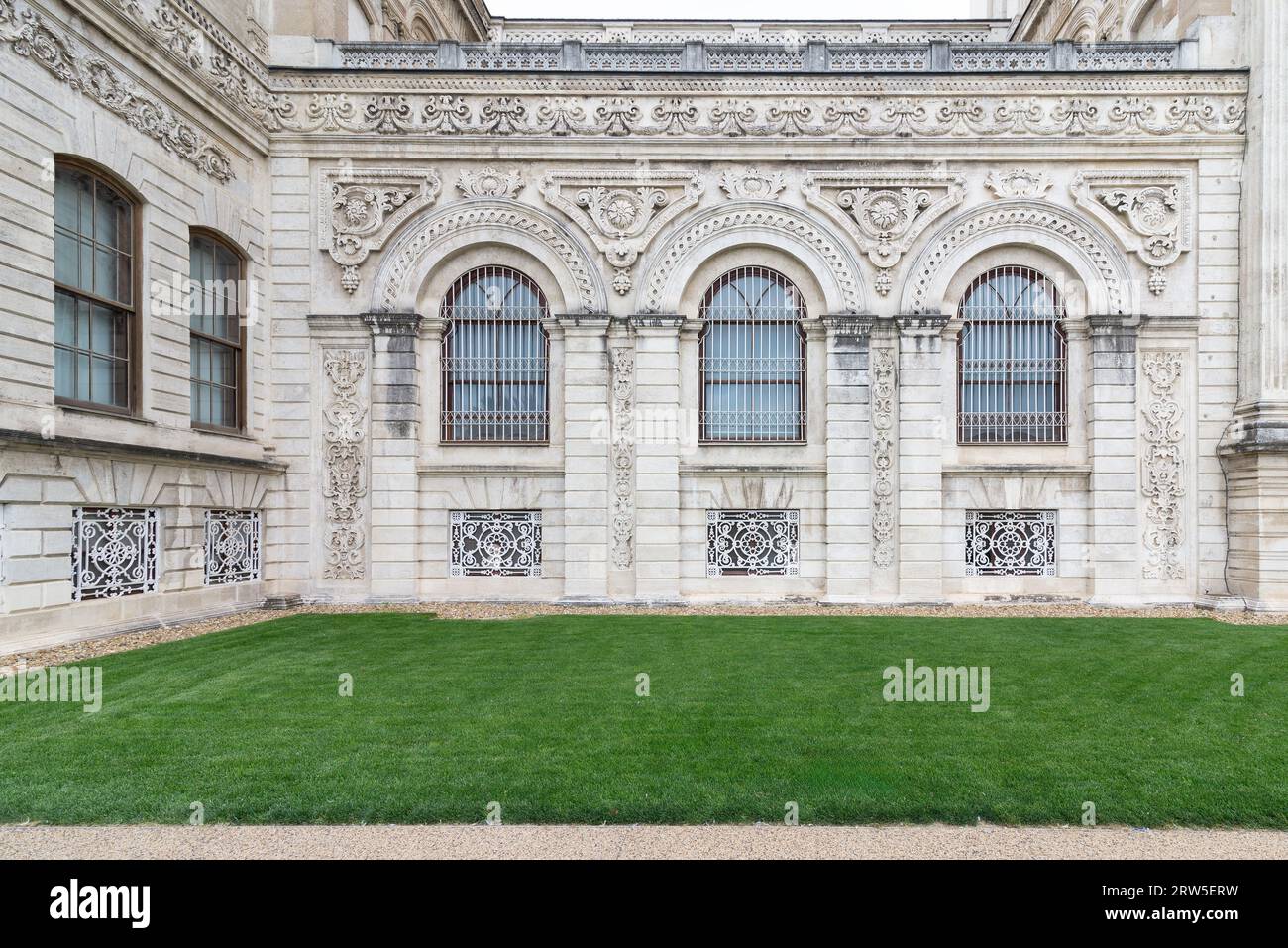 Side wall at Dolmabahce Palace, with three arched windows. Palace ...