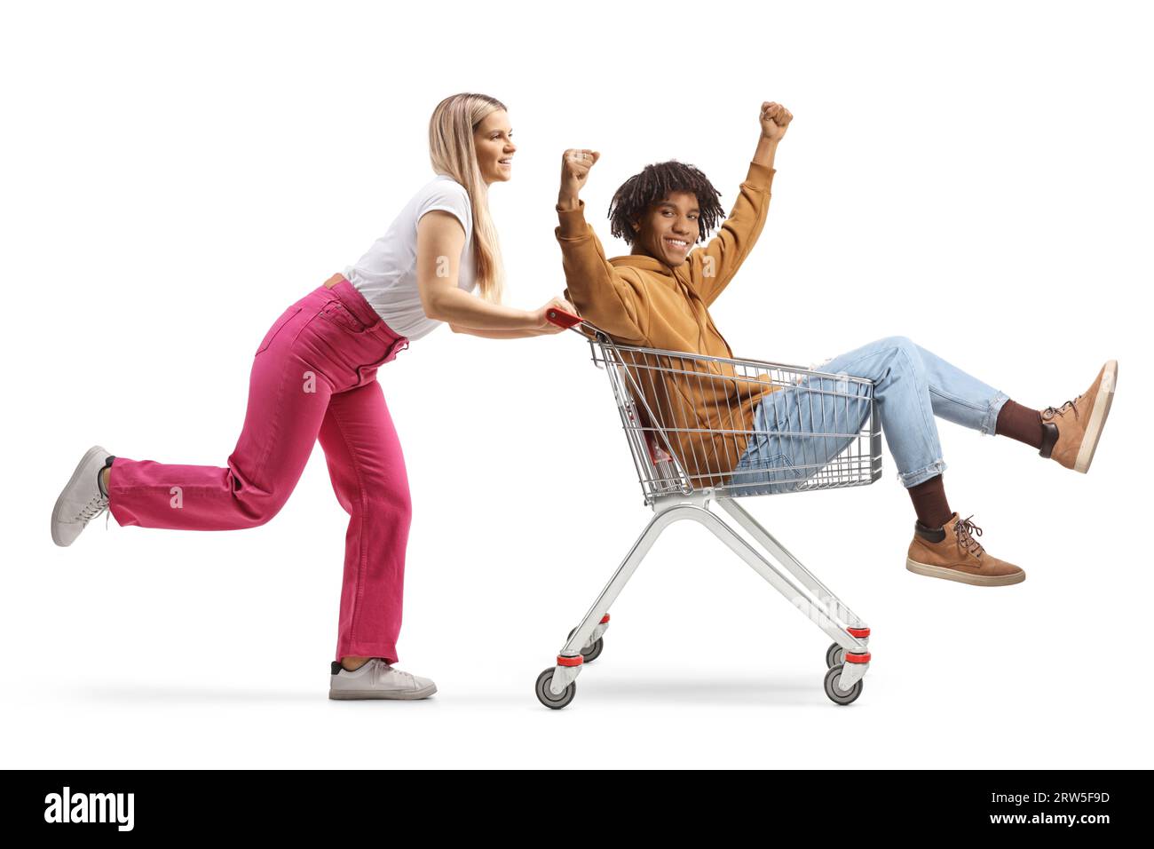 Caucasian young female pushing a shopping cart with an african american ...