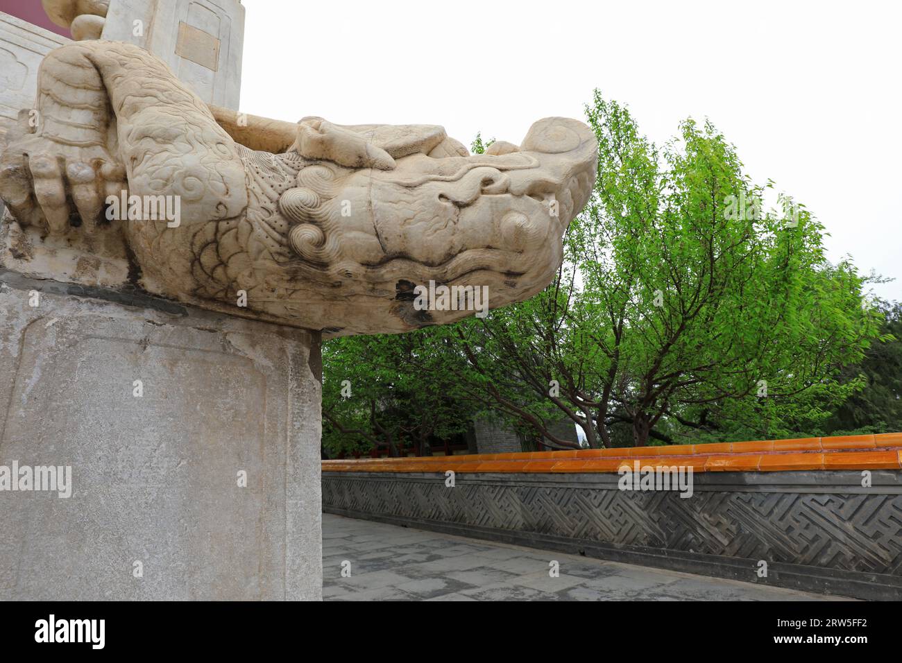 The dragon head sculpture is in a temple, Beijing Stock Photo - Alamy