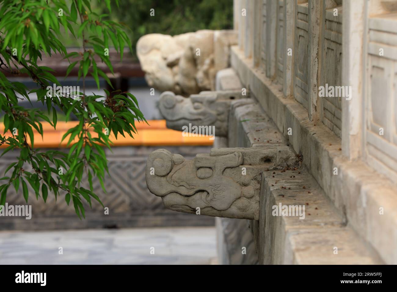 The dragon head sculpture is in a temple, Beijing Stock Photo - Alamy