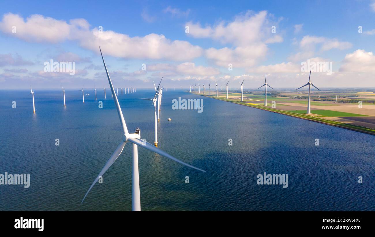 Ocean Wind Farm. Windmill farm in the ocean. Offshore wind turbines in ...