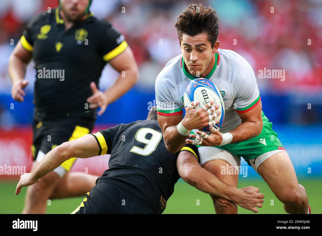 Tomos Williams #9 of Wales and Tomas Appleton #12 of Portugal during ...