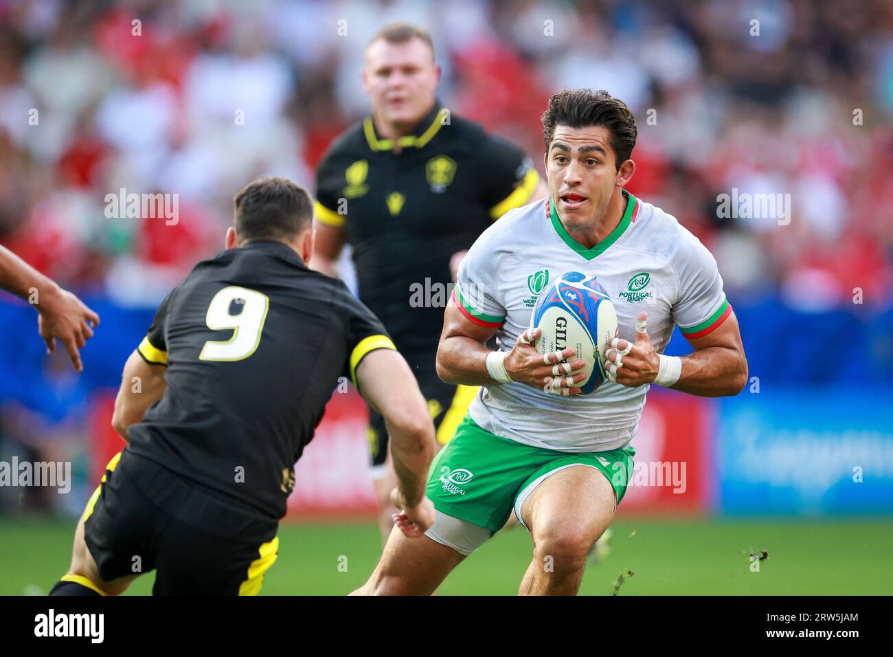 Tomos Williams #9 of Wales and Tomas Appleton #12 of Portugal during ...